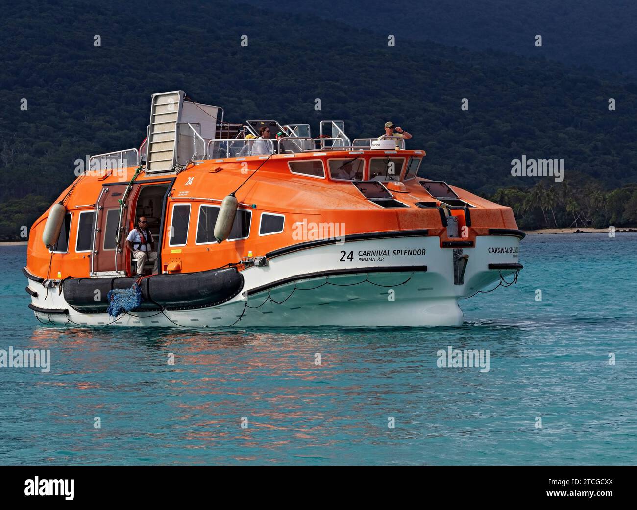 South Pacific Cruise / Cruise ship passengers aboard a tender boat from ...