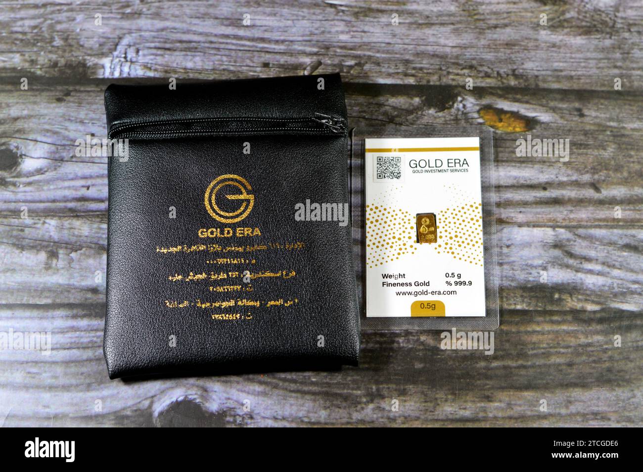 Cairo, Egypt, December 10 2023: Gold Era 24 Karate pure yellow gold bar ...