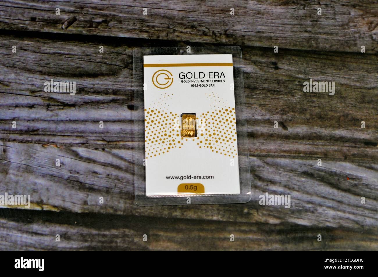 Cairo, Egypt, December 10 2023: Gold Era 24 Karate pure yellow gold bar ...