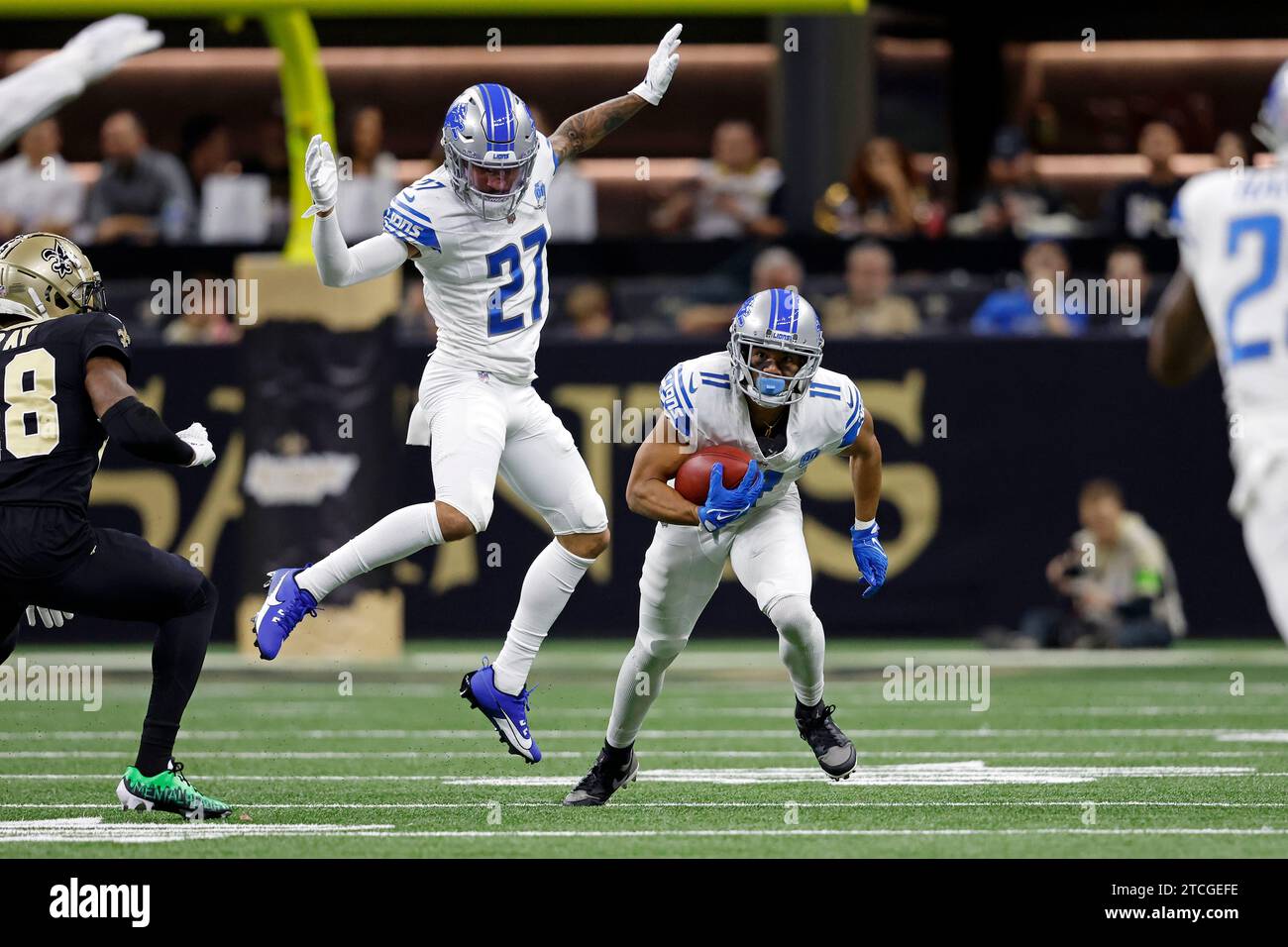 Detroit Lions wide receiver Kalif Raymond (11) and cornerback Chase ...