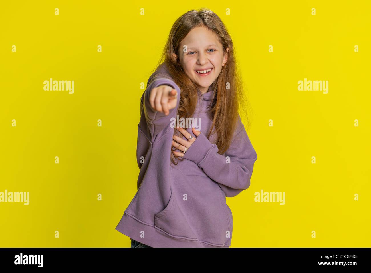 Happy young preteen child girl kid laughing out loud after hearing ...