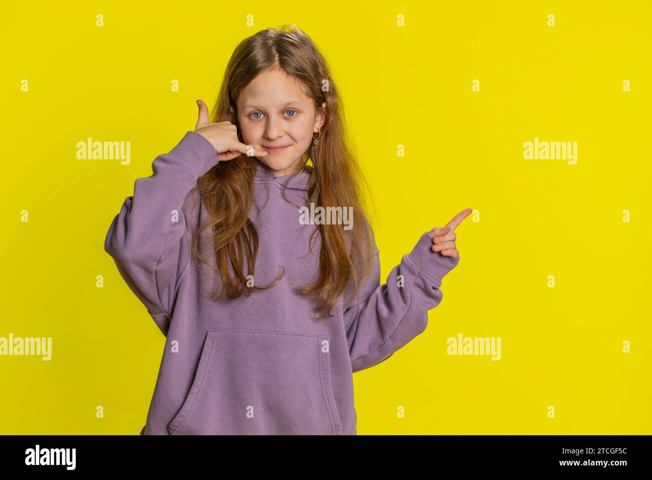 Call me, here is contact number. Preteen child girl kid looking at ...