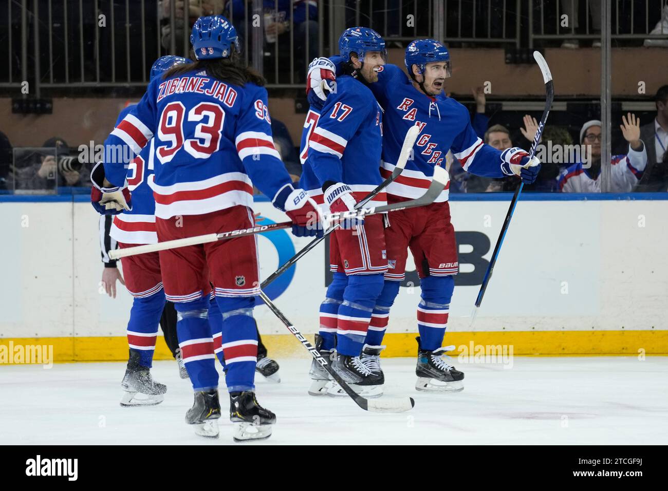 New York Rangers' Blake Wheeler (17) celebrates his goal with teammates ...