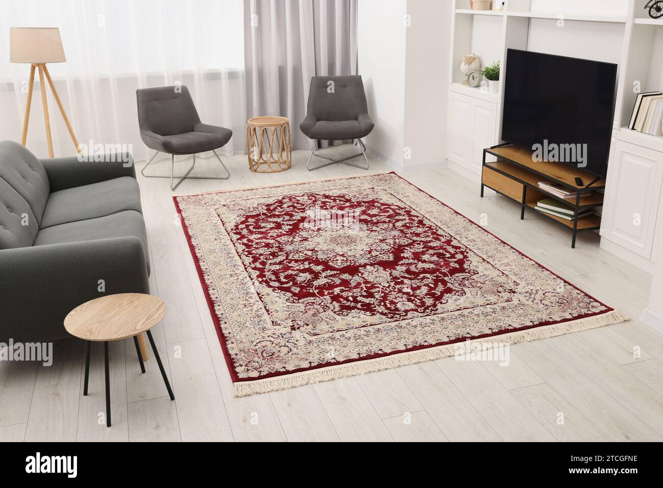 Stylish room with beautiful rug and furniture. Interior design Stock ...