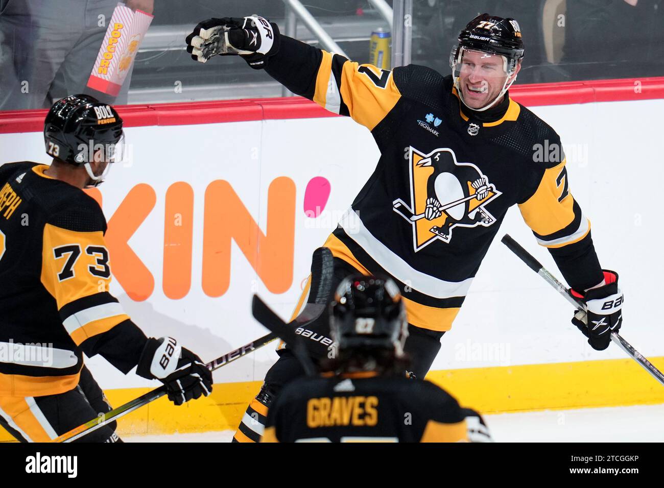 Pittsburgh Penguins' Jeff Carter (77) celebrates his goal with Pierre ...