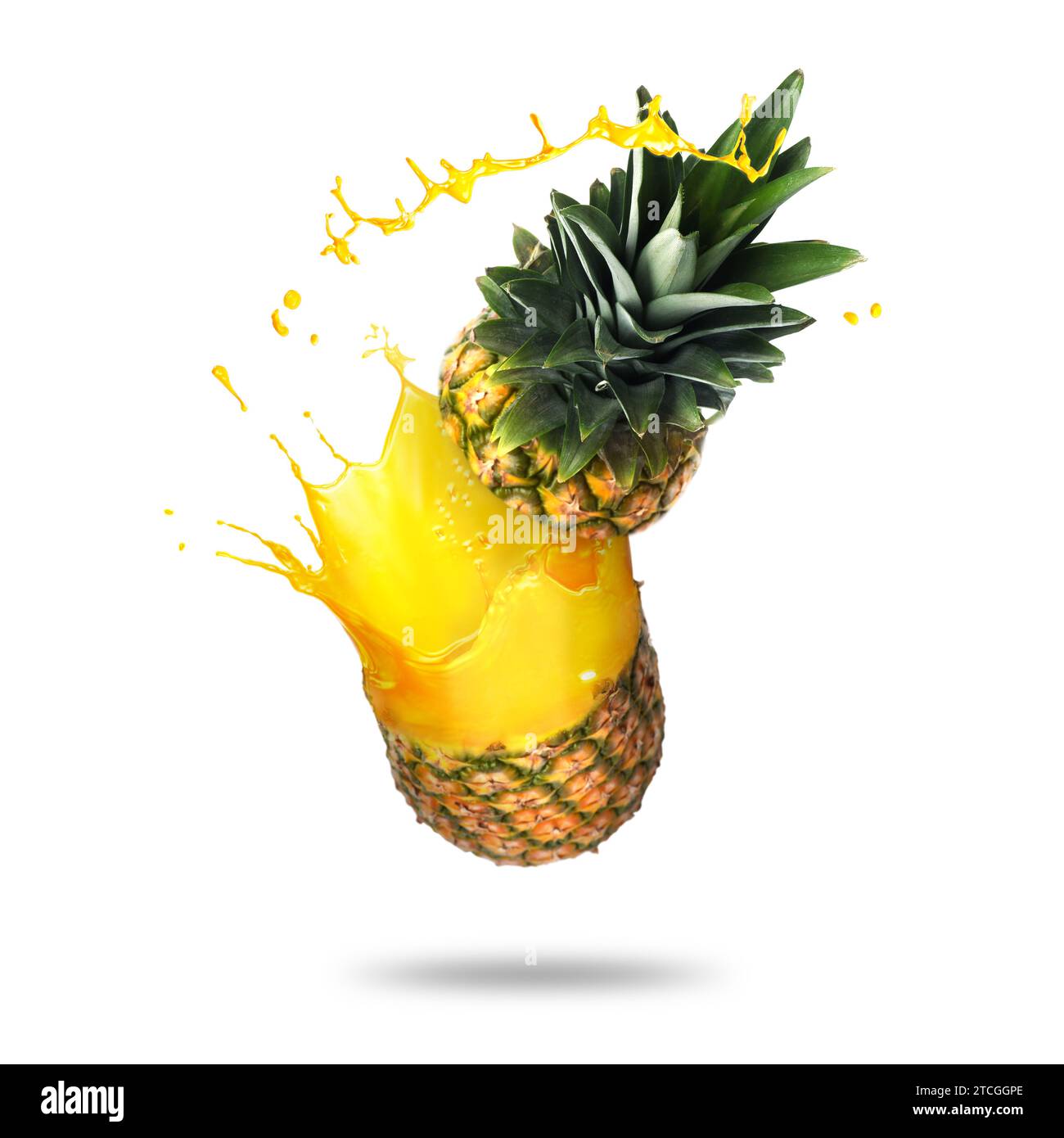 Pineapple with splashing juice isolated on white Stock Photo - Alamy