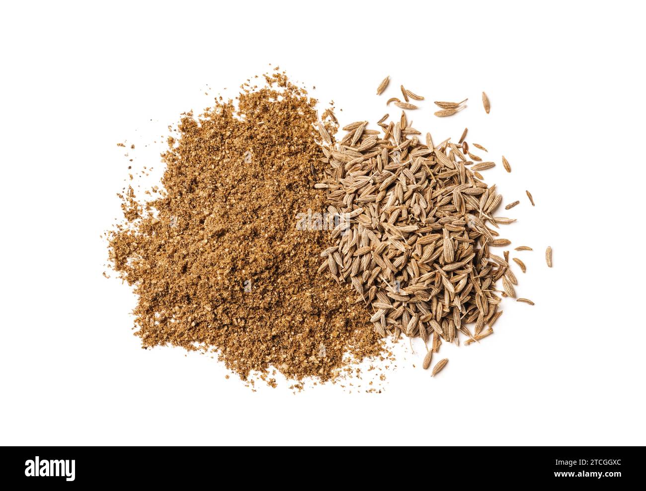 Heaps of aromatic caraway (Persian cumin) powder and seeds isolated on ...