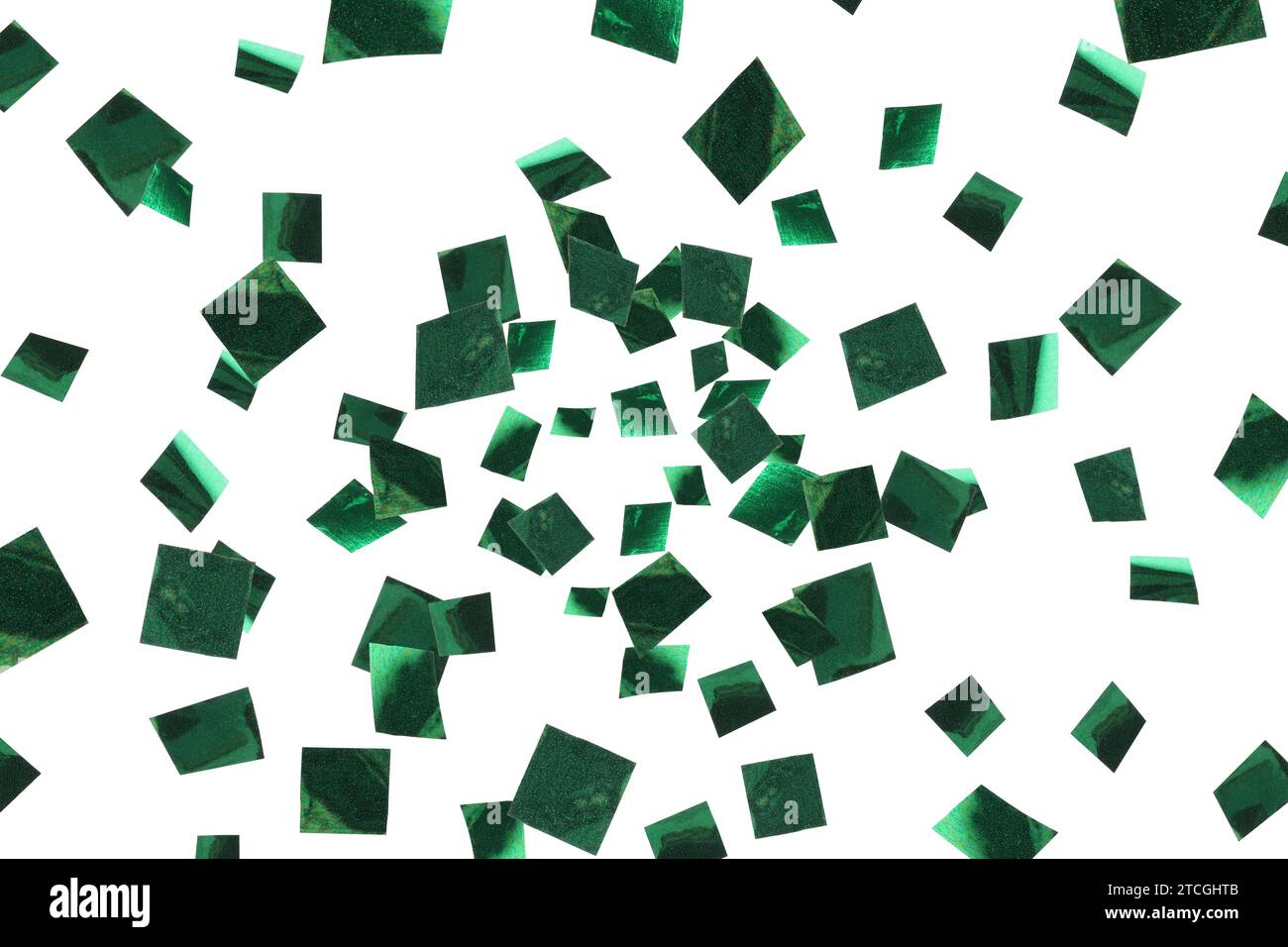 Shiny green confetti falling on white background Stock Photo - Alamy