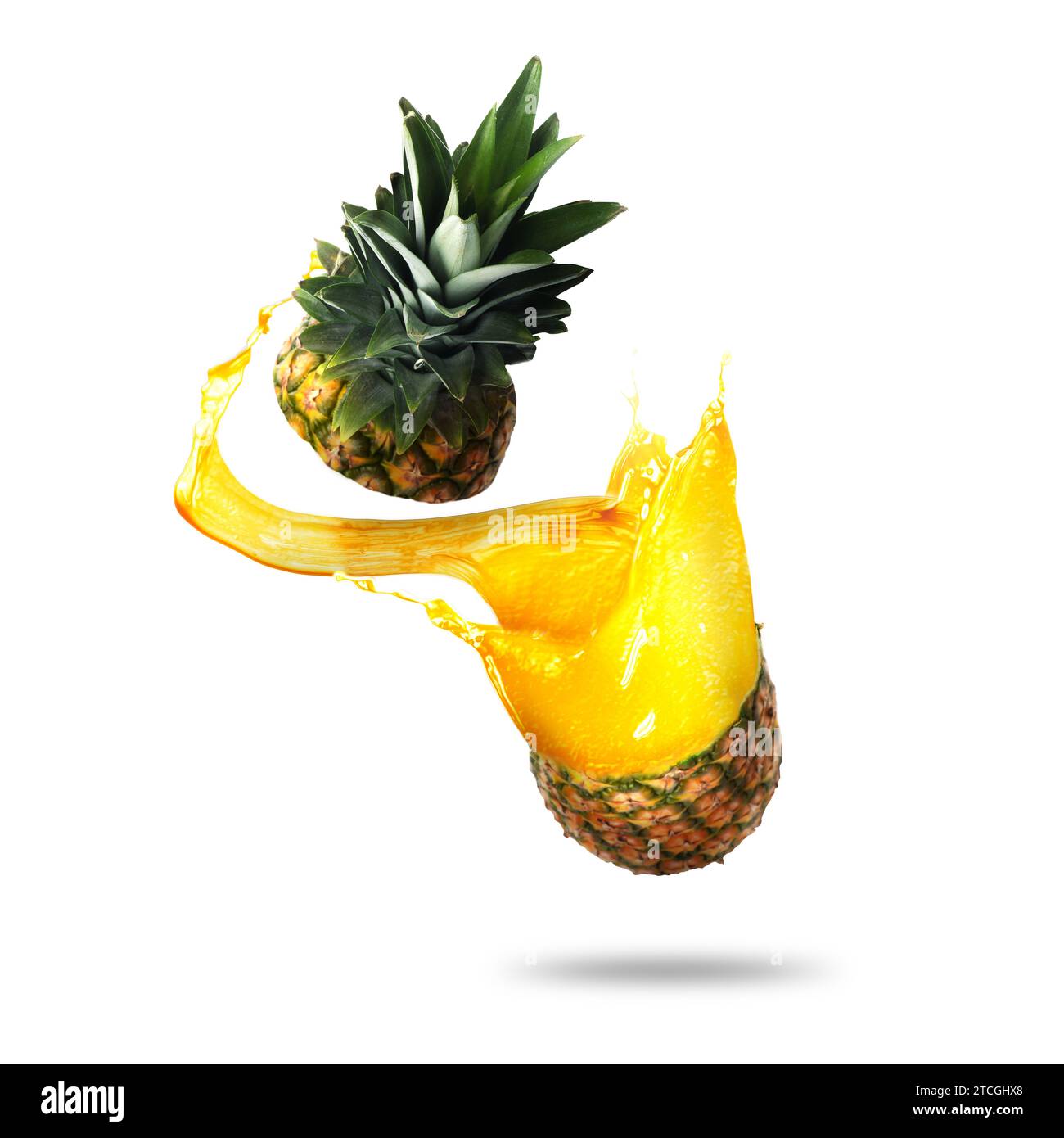 Pineapple with splashing juice isolated on white Stock Photo - Alamy