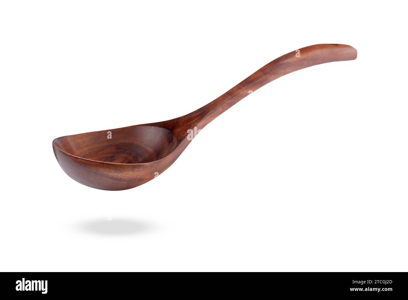 Wooden spoon in air isolated on white Stock Photo - Alamy
