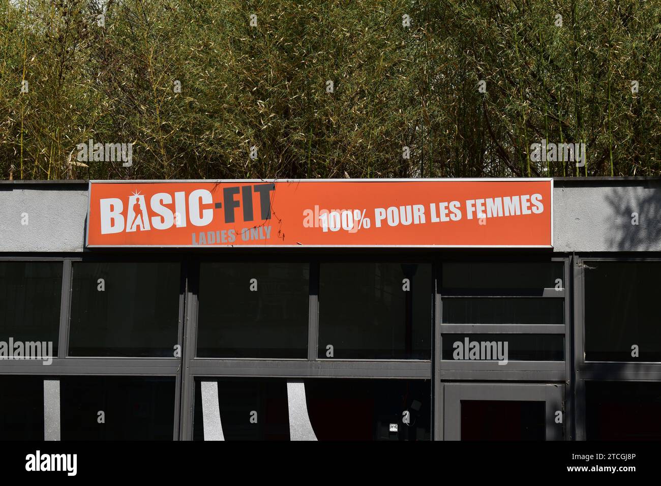 Orange sign of the Basic-fit ladies only in the city centre of Brussels ...