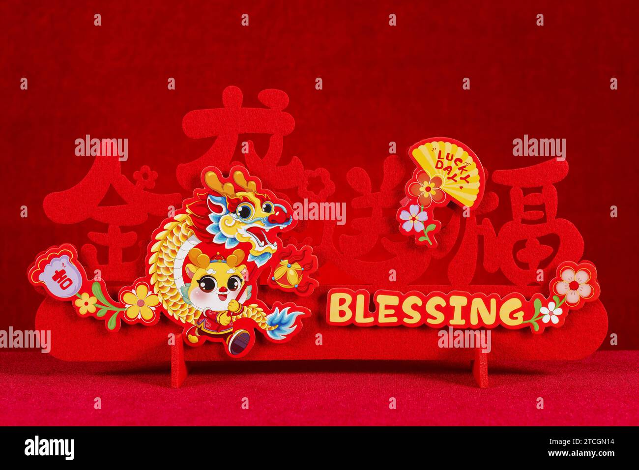 Chinese New Year of Dragon mascot paper cut on red background at ...