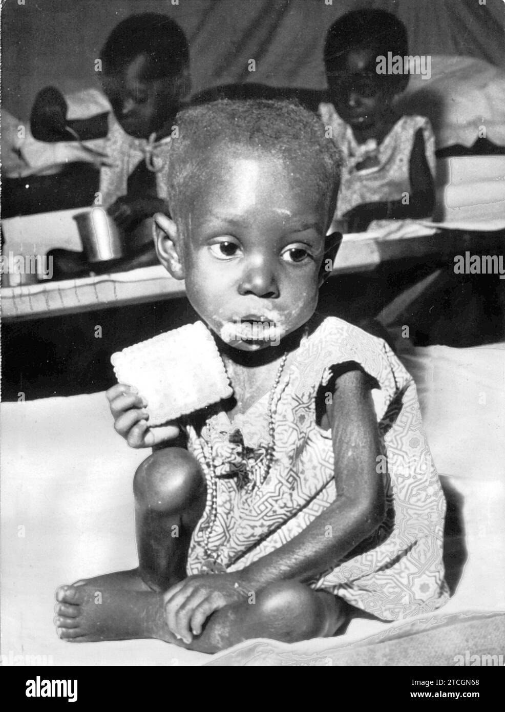 Boy eating a Black and White Stock Photos & Images - Alamy