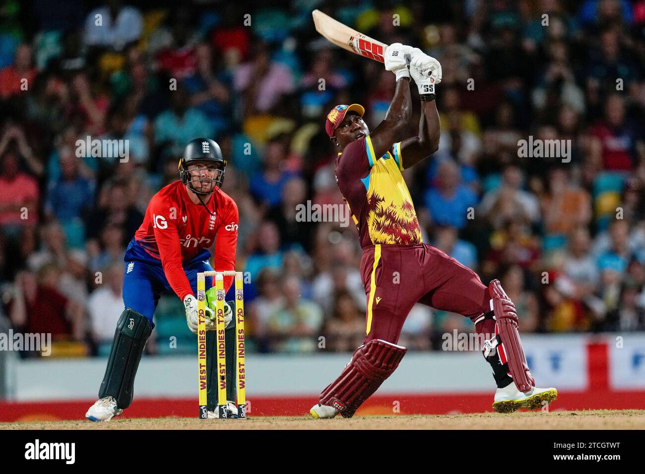 West Indies' Roman Powell hits a six against England during the first ...