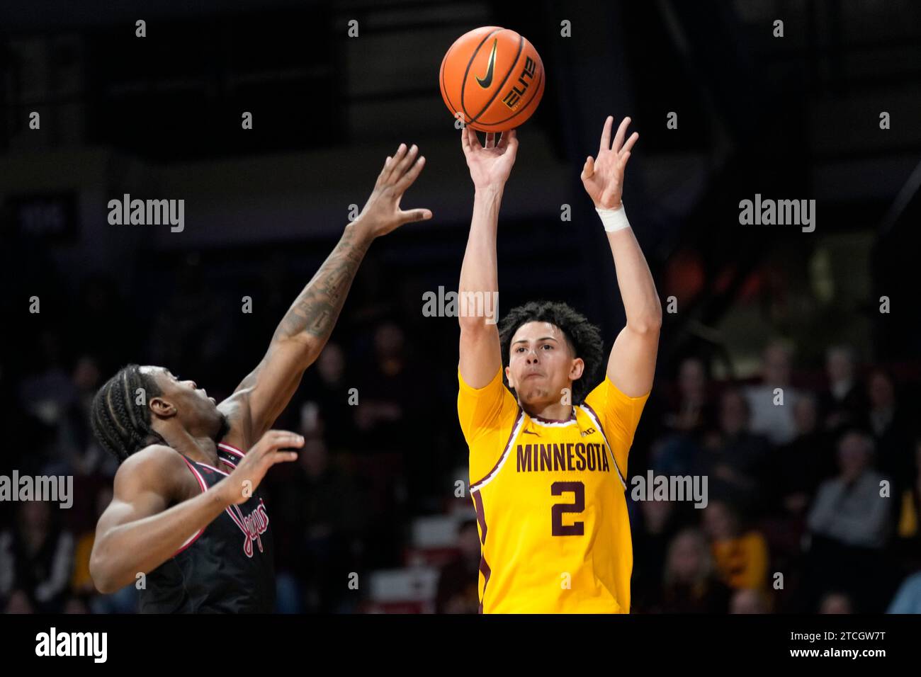 Minnesota guard Mike Mitchell Jr. (2) attempts a shot as IUPUI forward ...