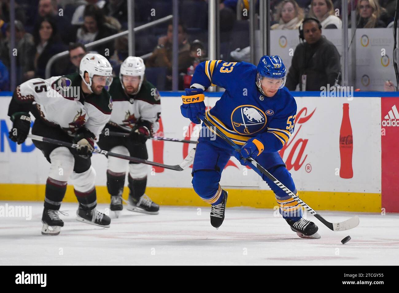 Buffalo Sabres left wing Jeff Skinner, right, skates the puck away from ...