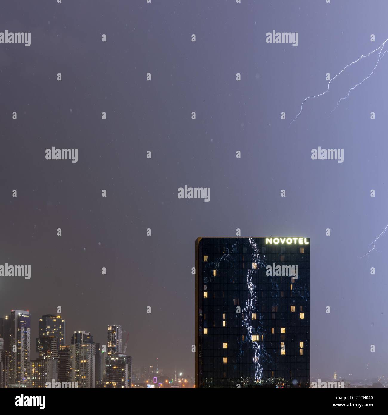 Docklands, 12 December 2023: A reflection of a lightning strike against ...