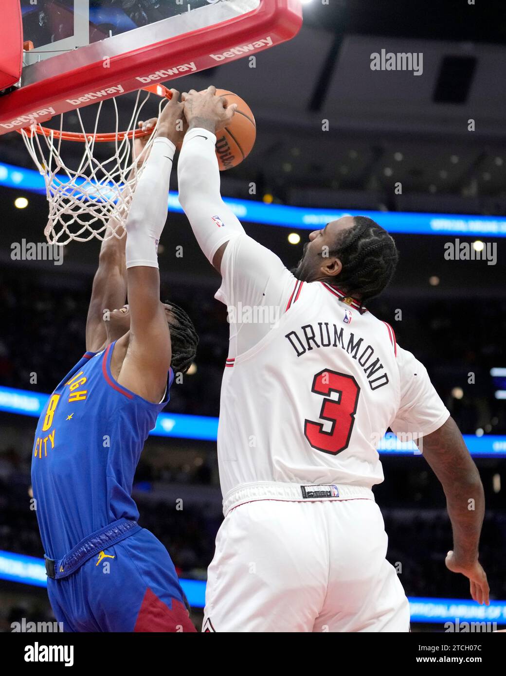 Chicago Bulls center Andre Drummond blocks the shot of Denver Nuggets ...
