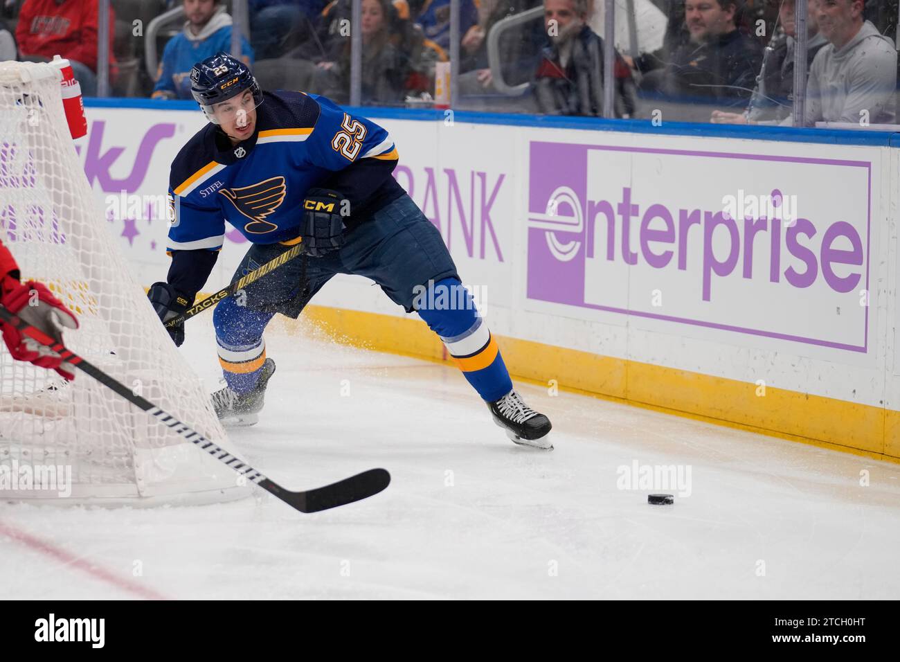 St. Louis Blues' Jordan Kyrou (25) chases after a loose puck along the ...