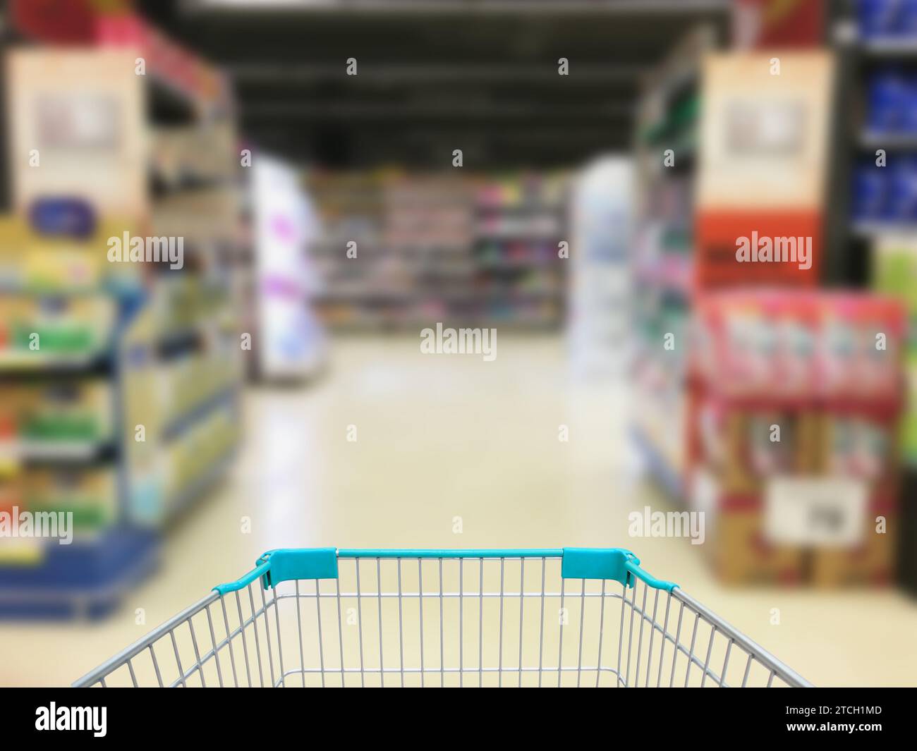 Shopping with Cart View in Supermarket blurred background Stock Photo ...