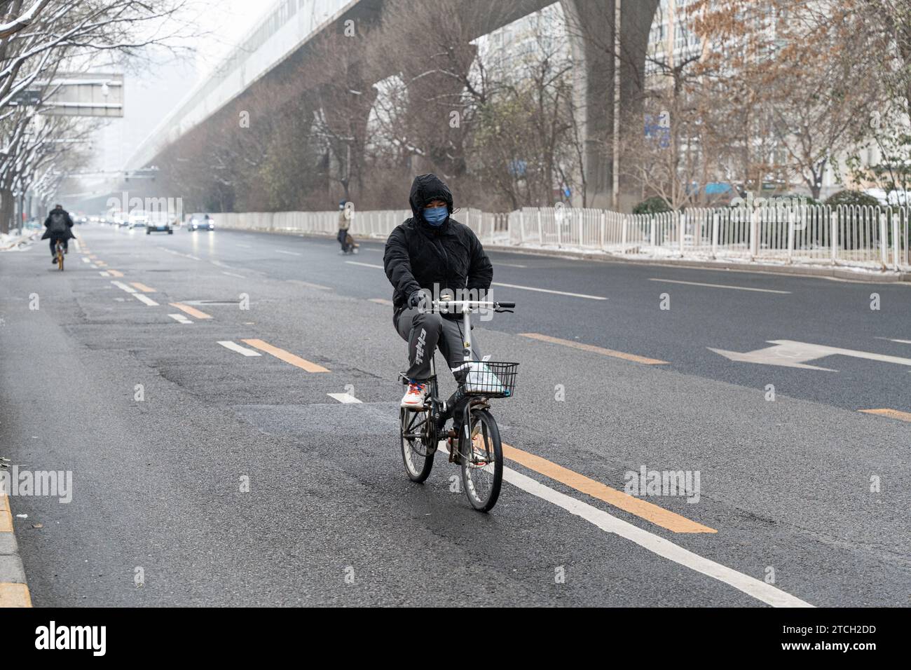 Beijing, China. 13 Dec, 2023. People of Beijing, commute to work on ...