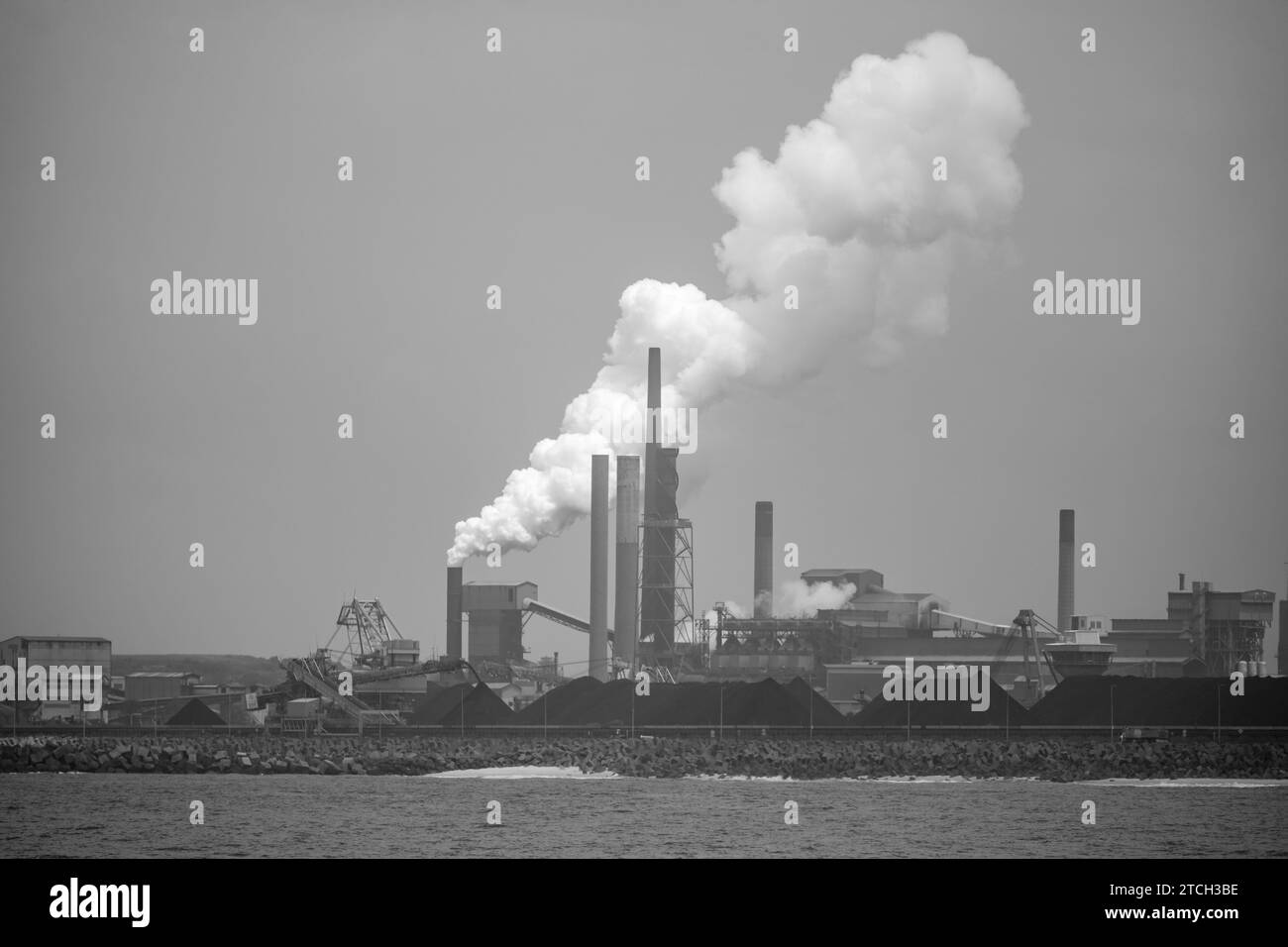 Industrial Factories Producing Pollution by the Ocean Stock Photo - Alamy