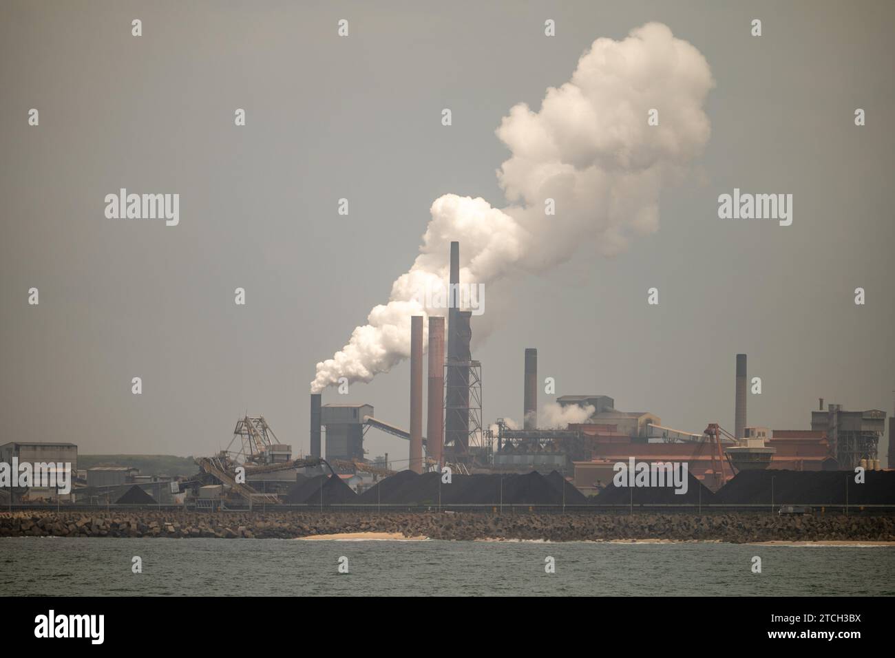 Industrial Factories Producing Pollution by the Ocean Stock Photo - Alamy