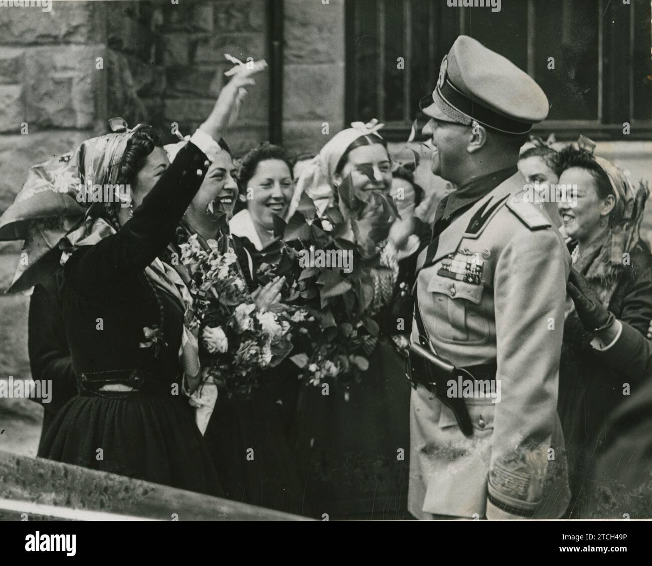 Santander, July 1939. Count Ciano talking with some beautiful mountain ...