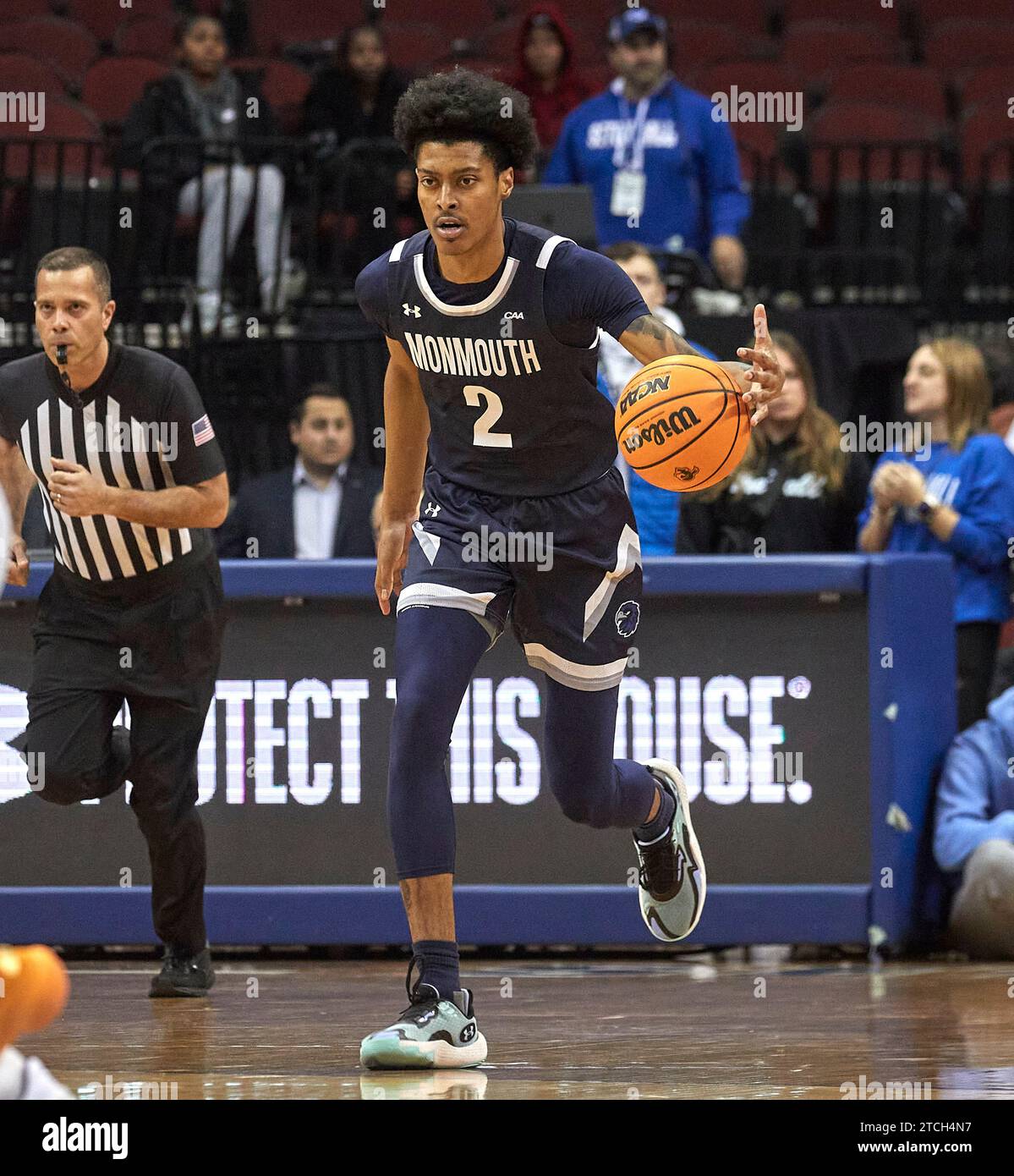 Monmouth Hawks forward Jaret Valencia (2) brings the ball up court ...