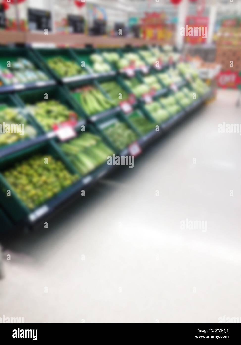 Vegetables and fruit on shelf in supermarket blurred background Stock ...