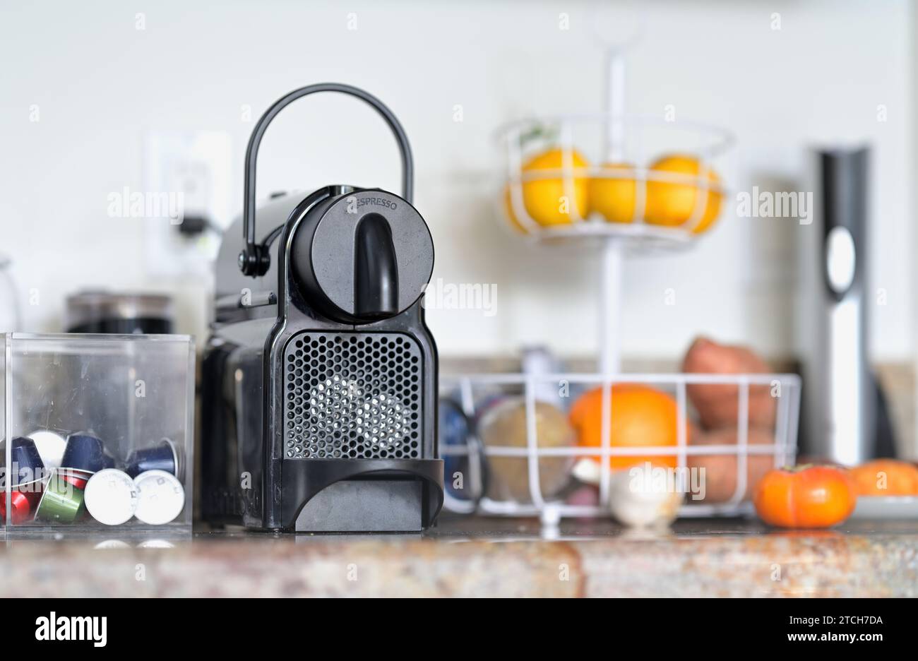 A Nespresso coffee machine and original capsules Stock Photo - Alamy