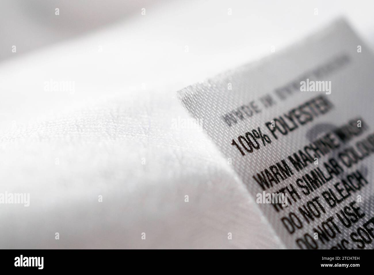 Polyester fabric Clothing label with laundry instructions Stock Photo ...