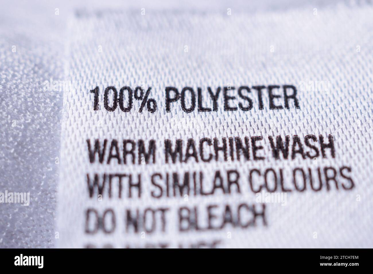 Polyester fabric Clothing label with laundry instructions Stock Photo ...