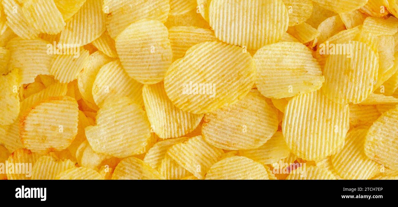 crispy potato chips snack texture background Stock Photo - Alamy