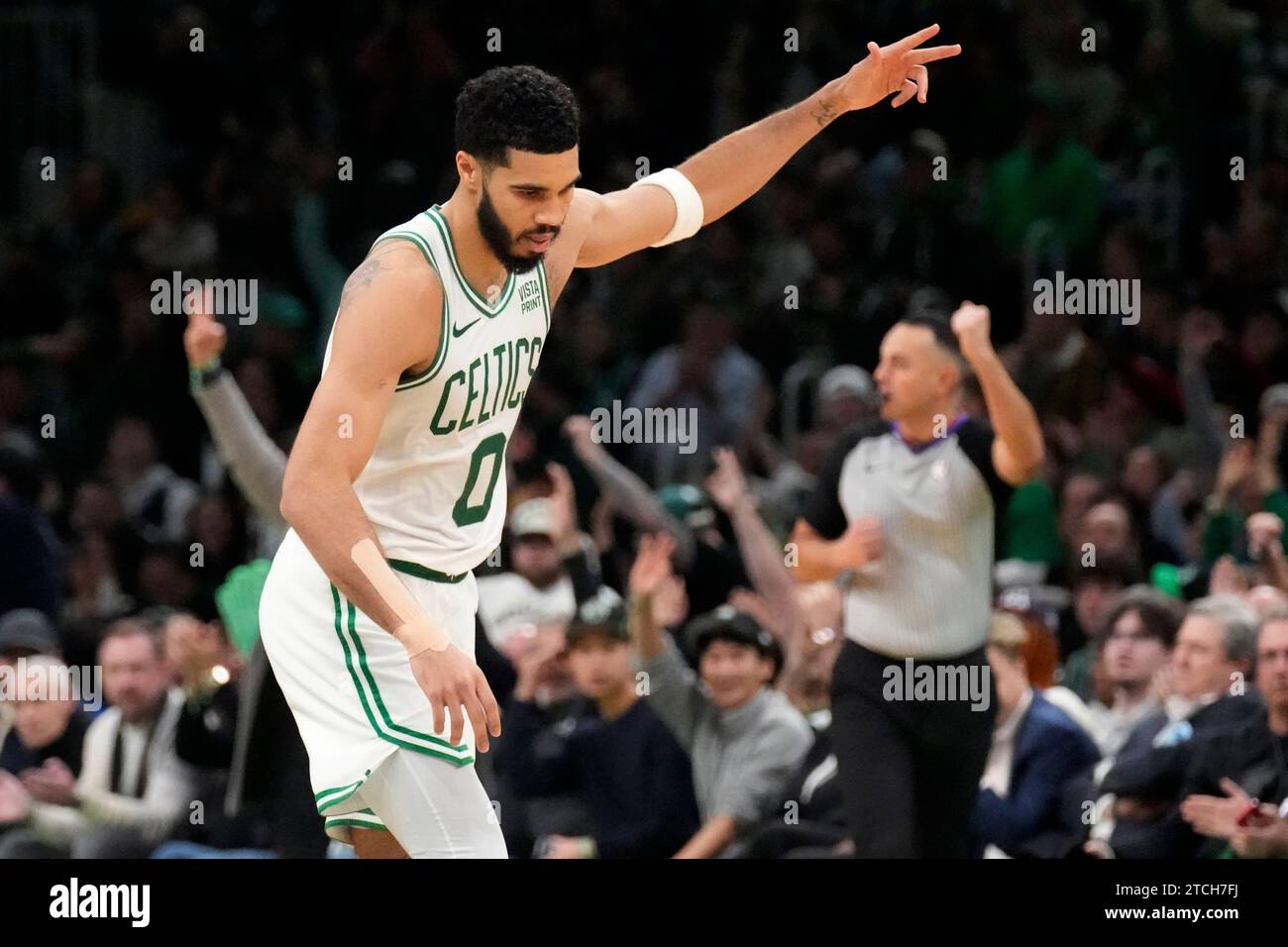 Boston Celtics forward Jayson Tatum celebrates after hitting a 3 ...