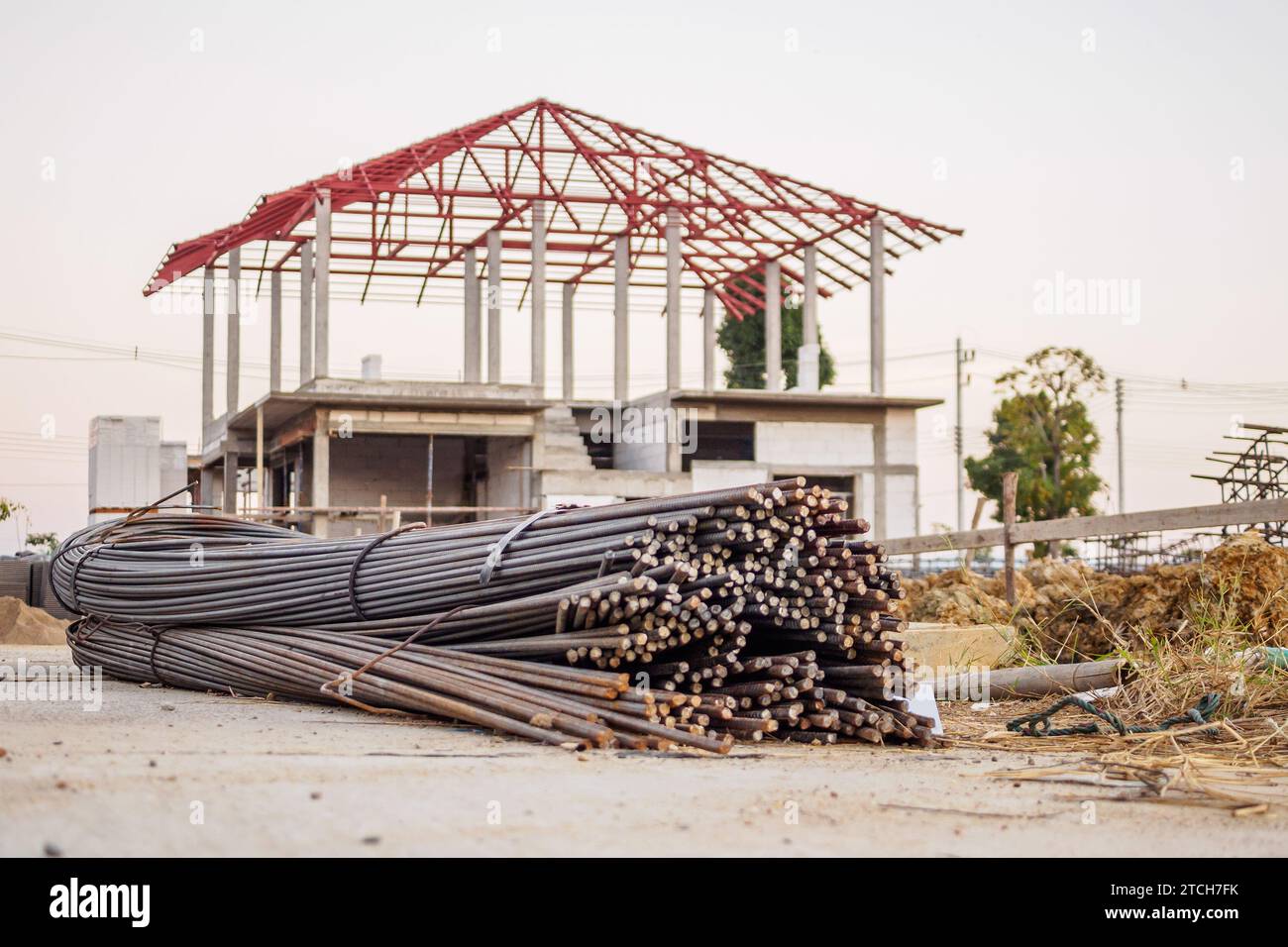 steel rebar for reinforcement concrete at construction site with house ...