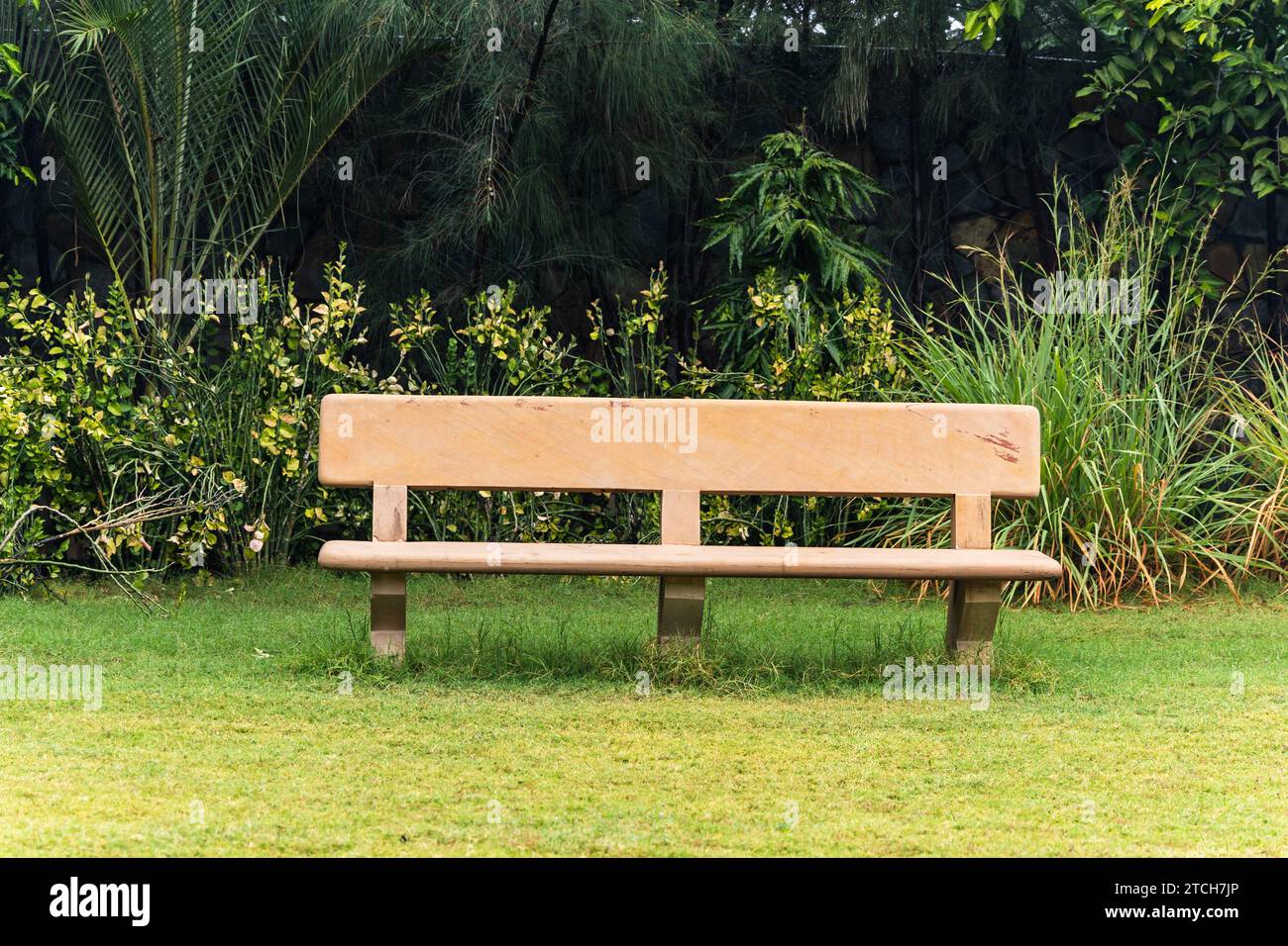 isolated bench cover at lush green park at morning from flat angle ...