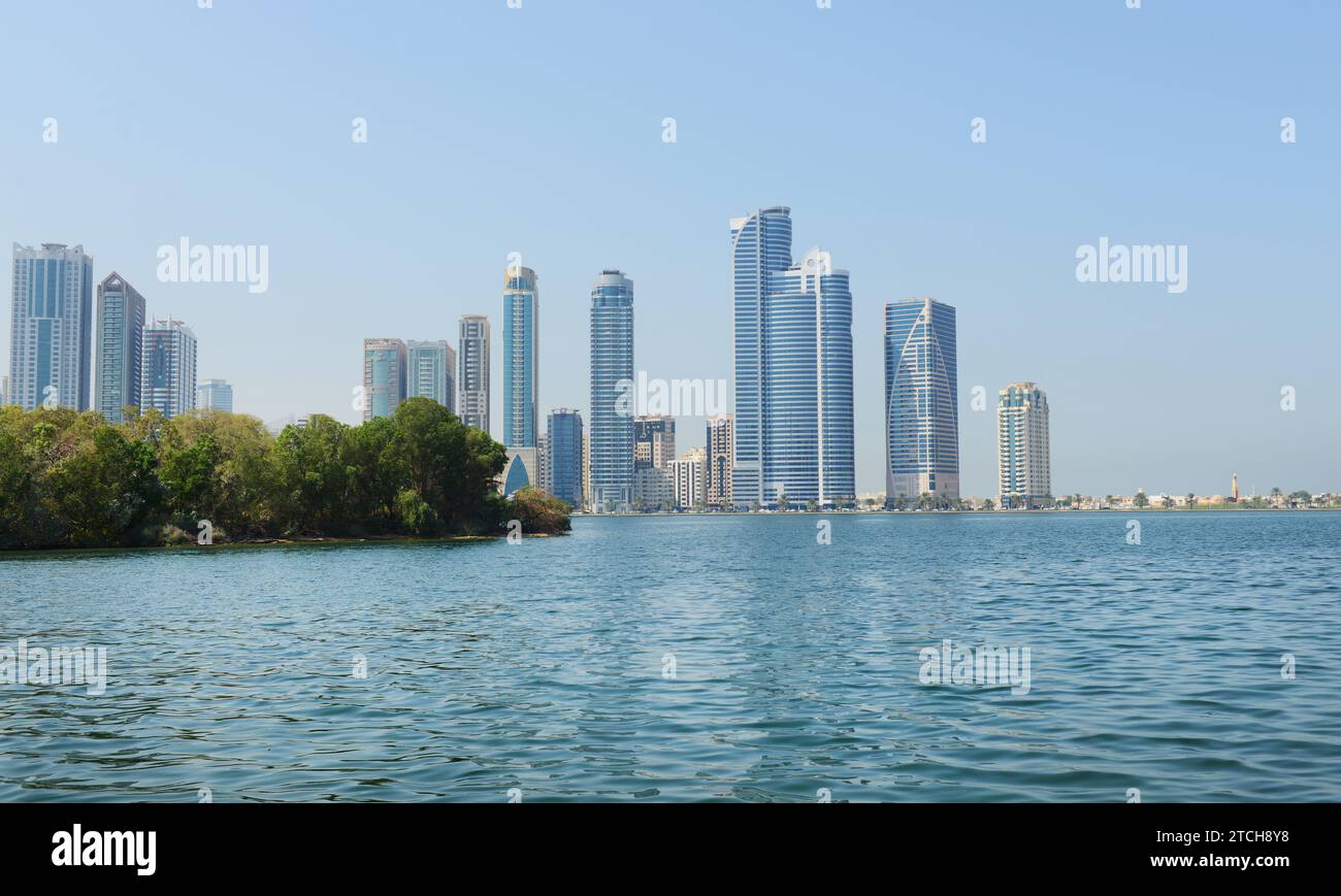 The modern skyline of Sharjah, UAE Stock Photo - Alamy