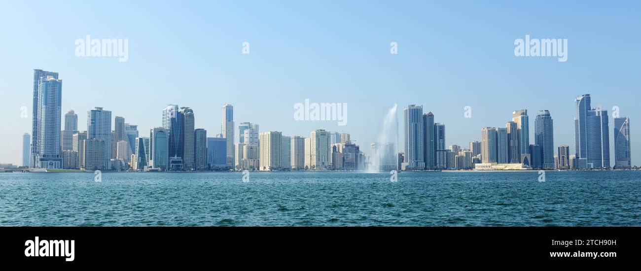 The modern skyline of Sharjah, UAE Stock Photo - Alamy