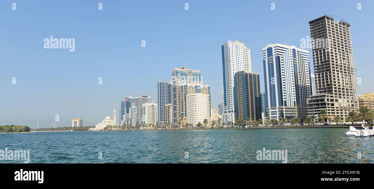 The modern skyline of Sharjah, UAE Stock Photo - Alamy