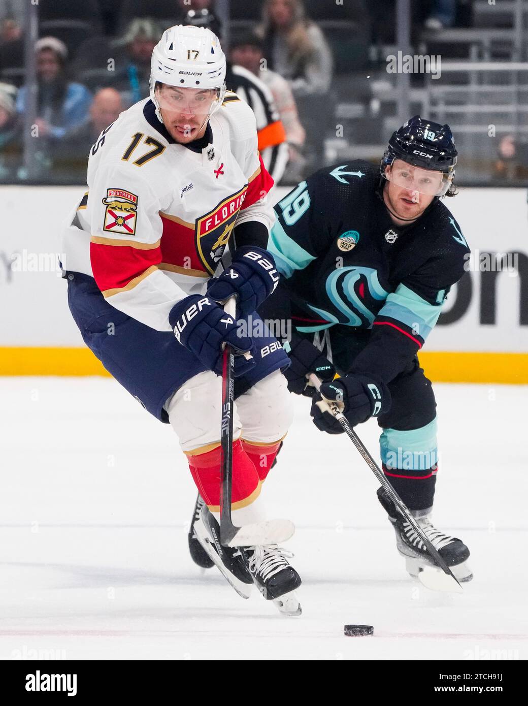 Florida Panthers center Evan Rodrigues (17) moves the puck away from ...