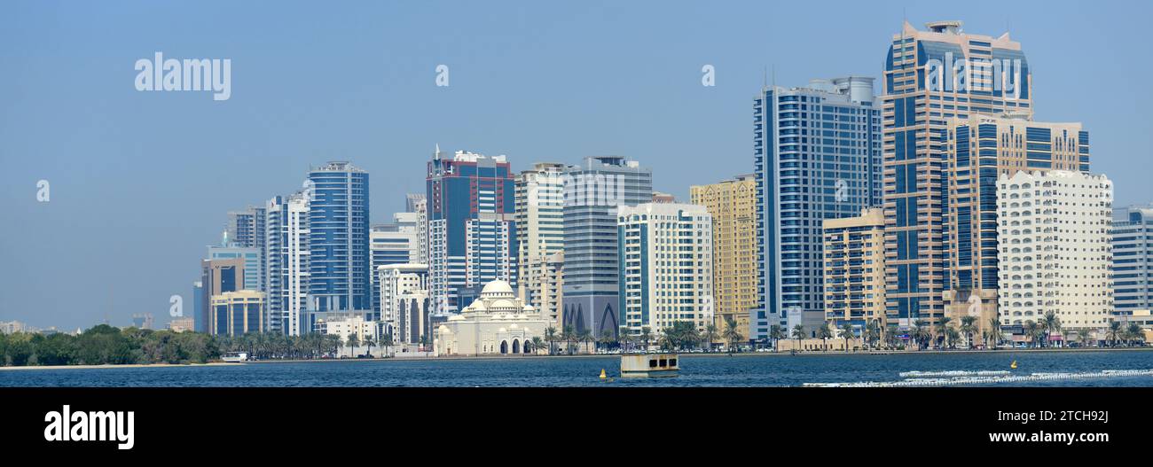 The modern skyline of Sharjah, UAE Stock Photo - Alamy