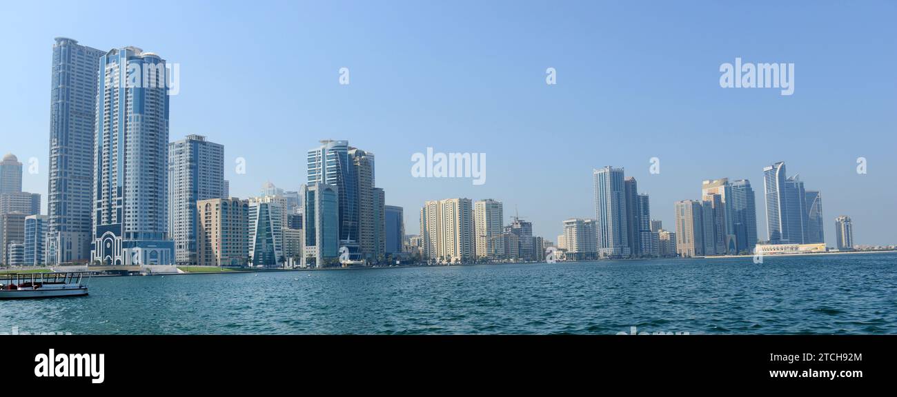 The modern skyline of Sharjah, UAE Stock Photo - Alamy