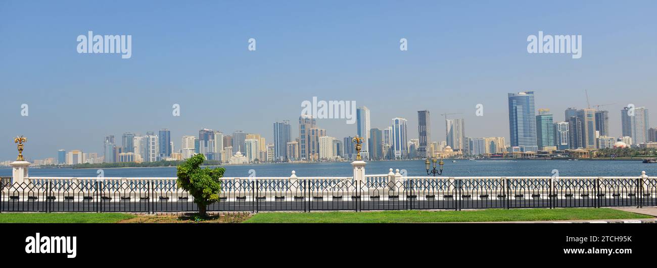 The modern skyline of Sharjah, UAE Stock Photo - Alamy