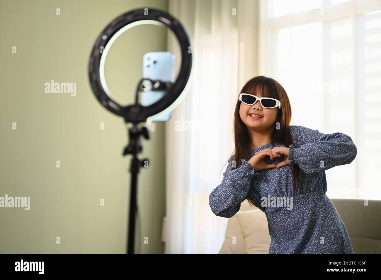 Teenager girl filming smartphone hi-res stock photography and images ...