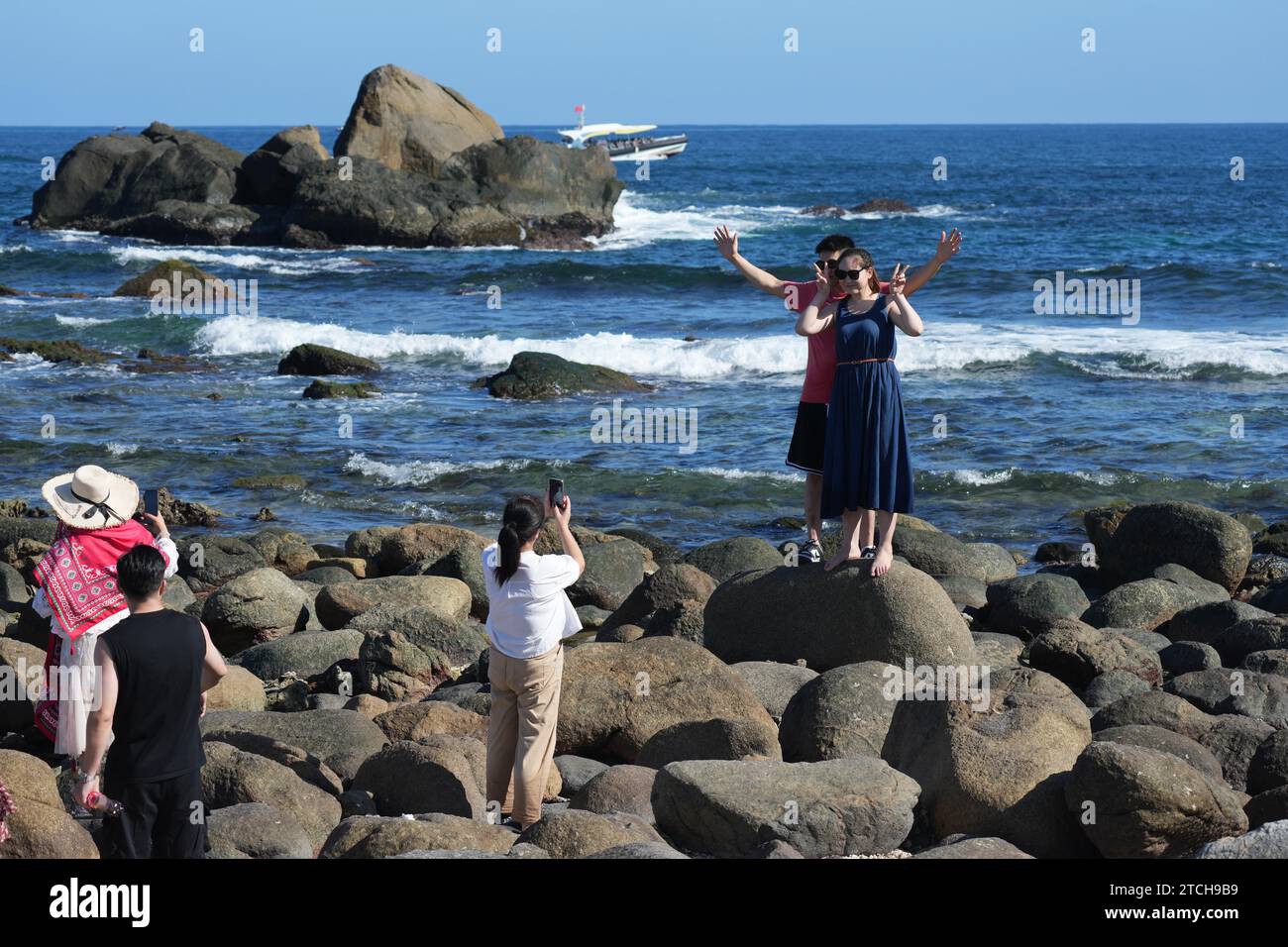 **CHINESE MAINLAND, HONG KONG, MACAU AND TAIWAN OUT** Tourists travel ...