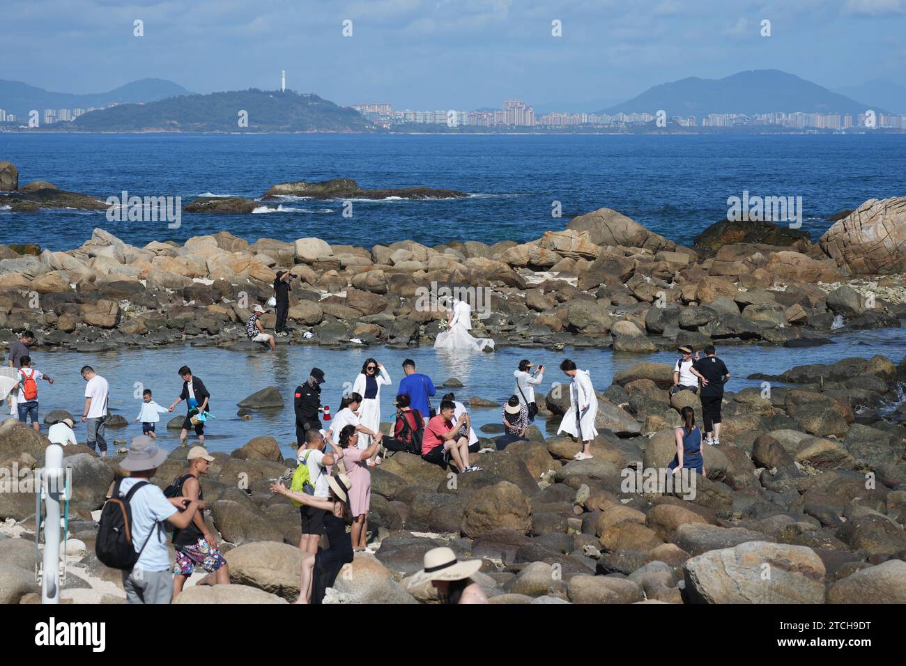 **CHINESE MAINLAND, HONG KONG, MACAU AND TAIWAN OUT** Tourists travel ...