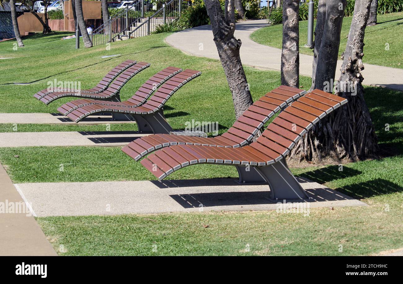 Group of curved wooden seats at Yeppoon in Queensland, Australia Stock ...