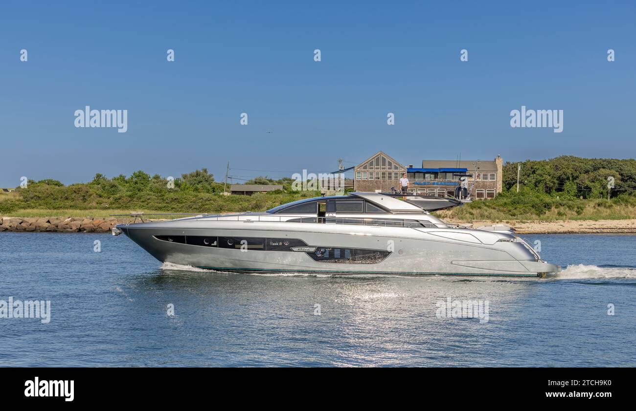 silver motor yacht in the montauk inlet Stock Photo - Alamy
