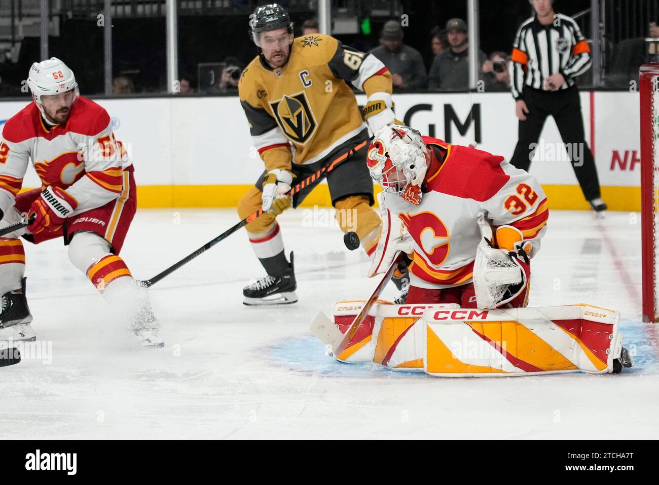 Calgary Flames goaltender Dustin Wolf (32) blocks a shot by the Vegas ...